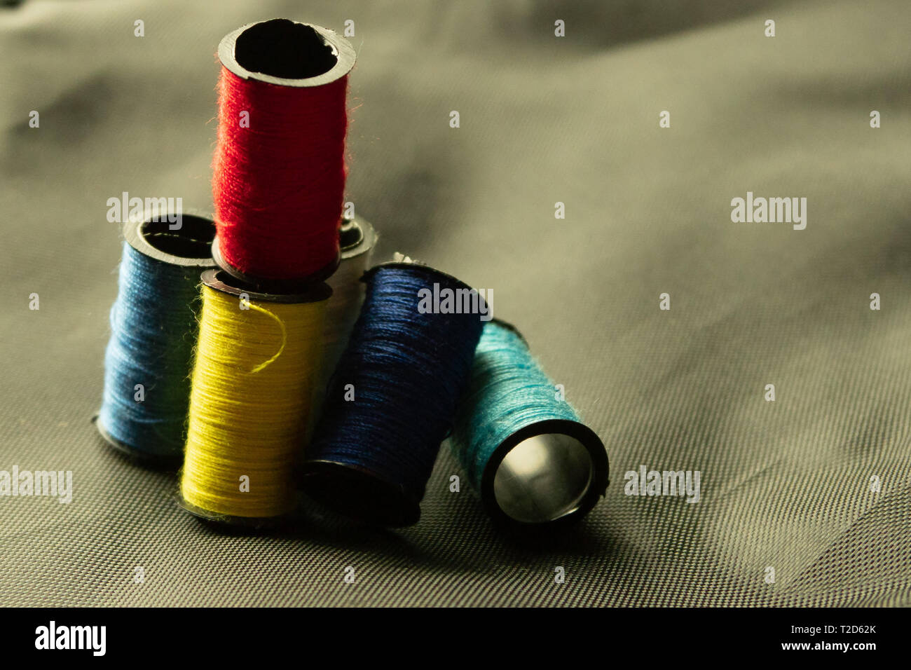 Coloured cotton reels hi-res stock photography and images - Alamy