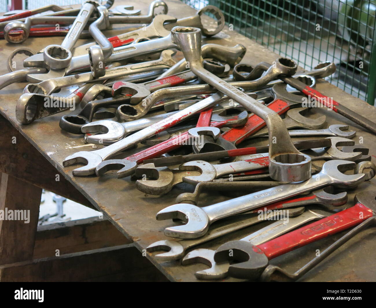 Workbench with a large array of spanners of various sizes; tools of the ...