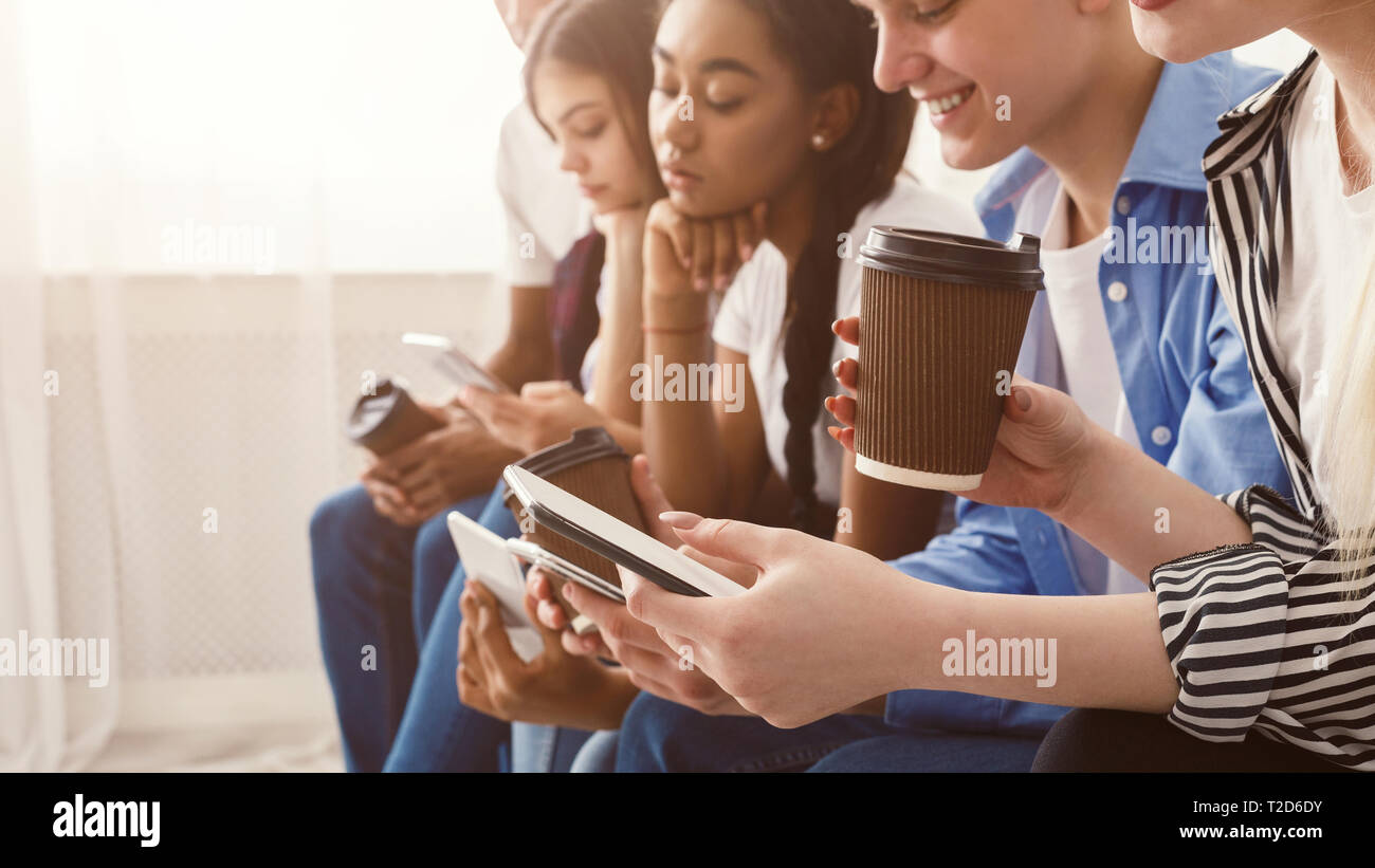 Gadget addiction. Friends using phones, chatting in social networks ...
