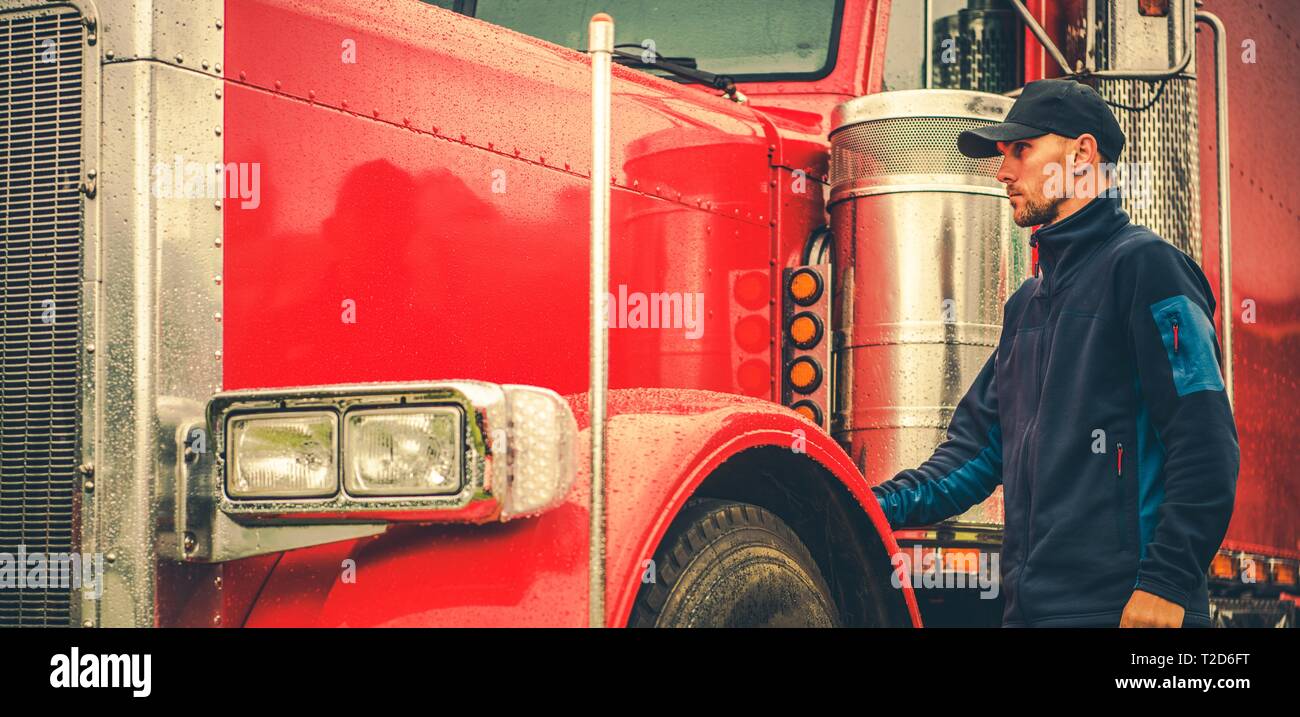 Automotive industry. Modern Truck Transportation. Caucasian Trucker in ...