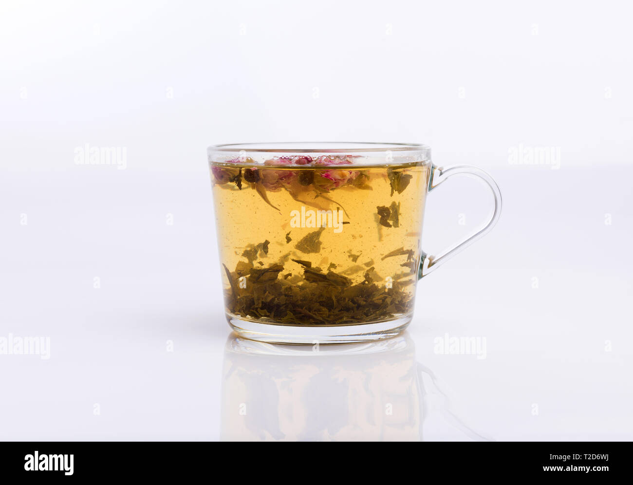 Glass cup of green tea with roses. Isolated on white background Stock ...