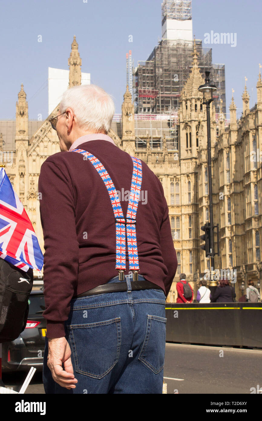 British man walking by UK Parliament Stock Photo - Alamy