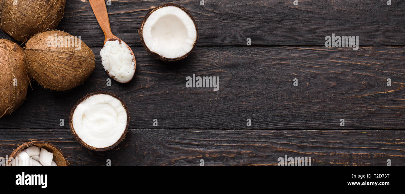 Set of coconut products on wooden background top view, copy space ...