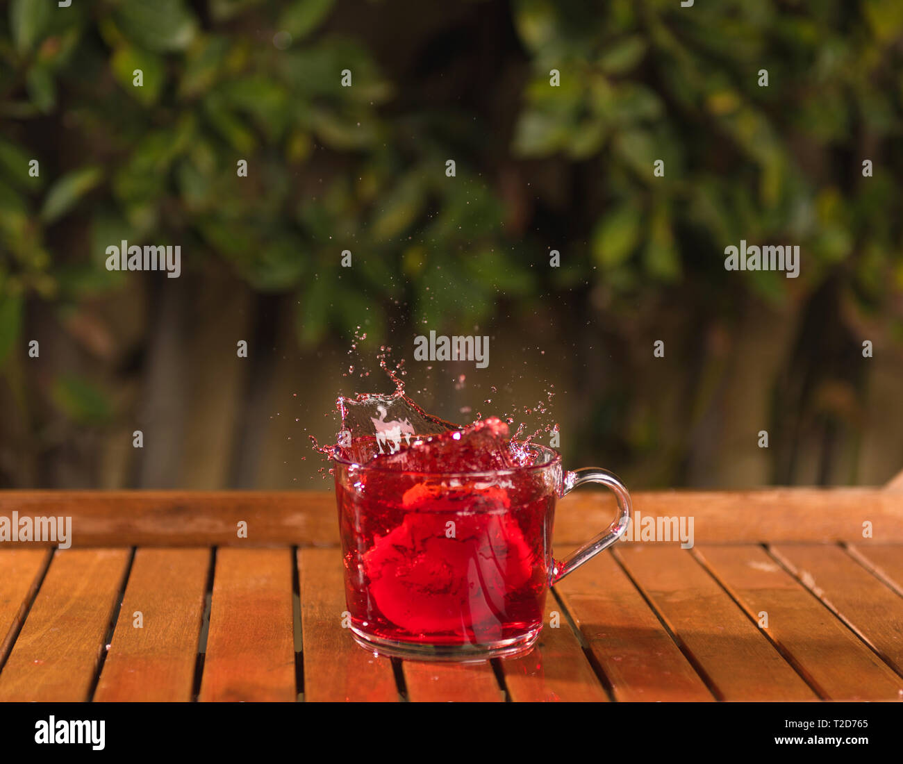 Cold tea splash outdoor. Summer composition outdoor Stock Photo - Alamy