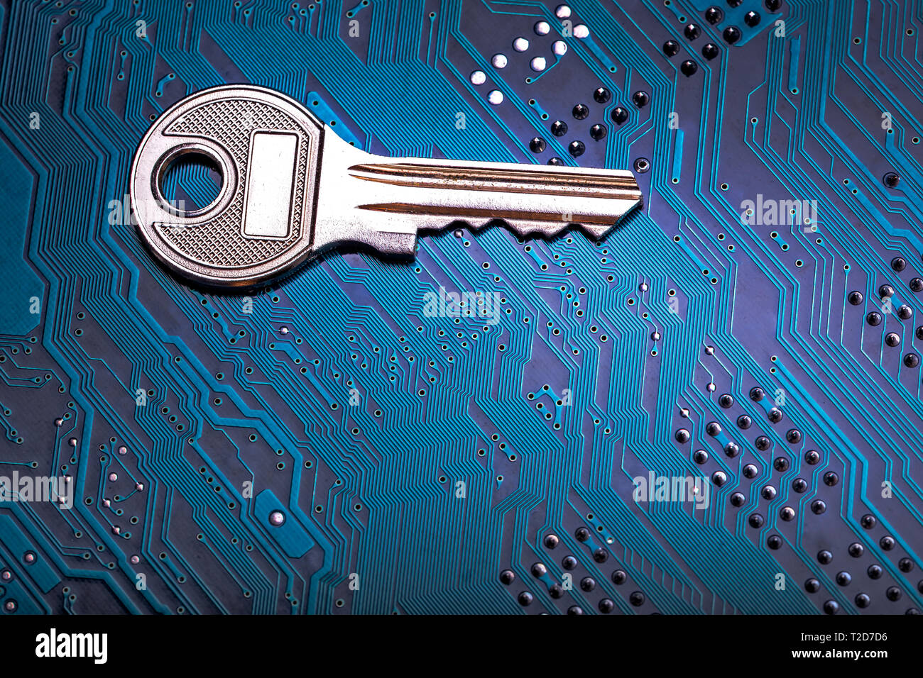 Background image of key on a microchip Stock Photo - Alamy