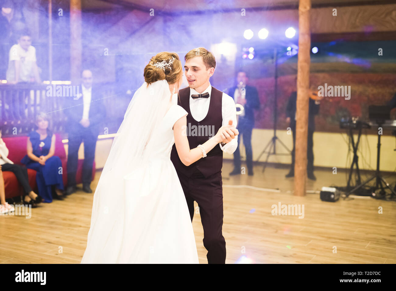 Beautiful wedding couple just married and dancing their first dance Stock Photo - Alamy