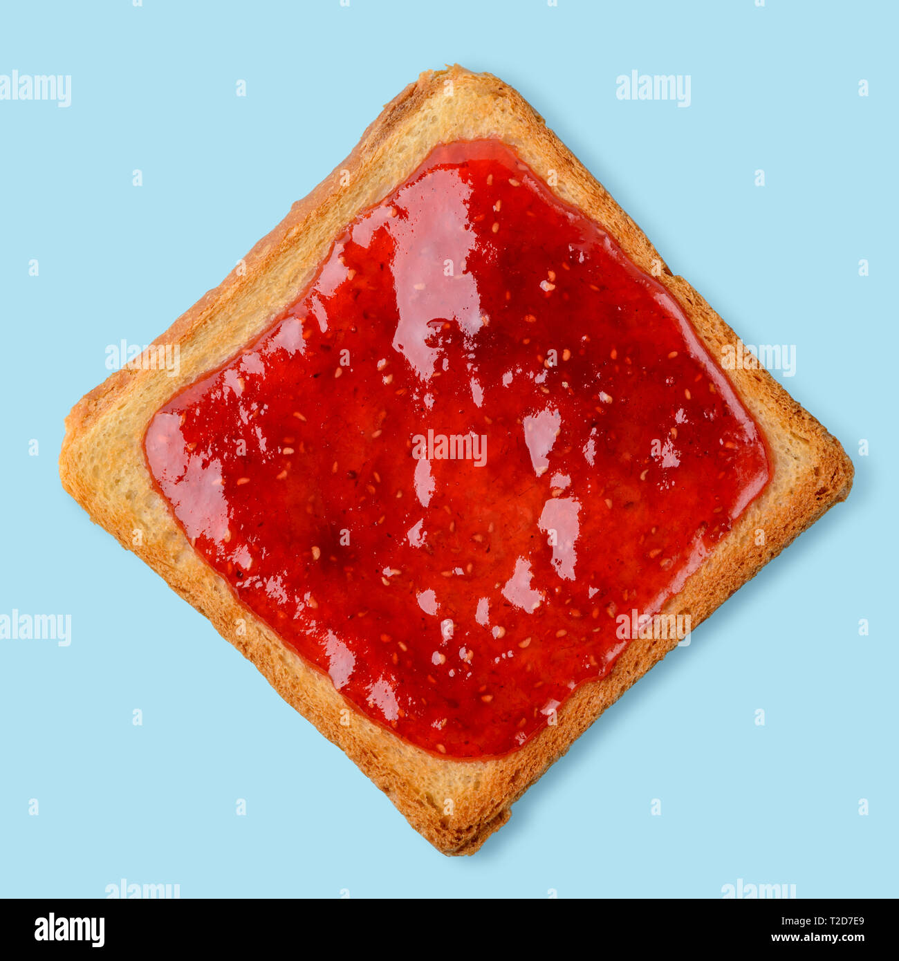 Toast with raspberry jam Stock Photo - Alamy