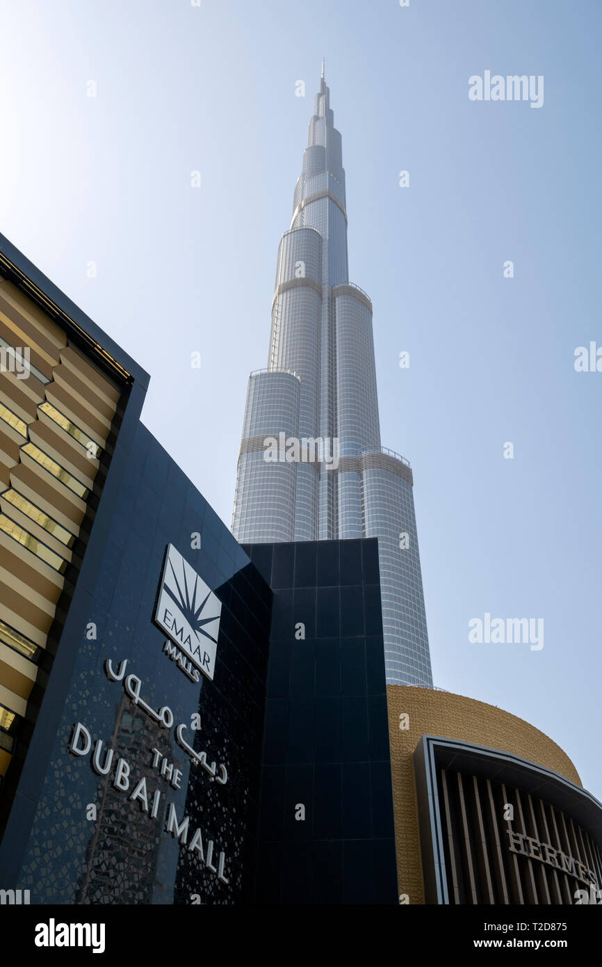 The Dubai Mall building in front of the Burj Khalifa skyscraper in ...