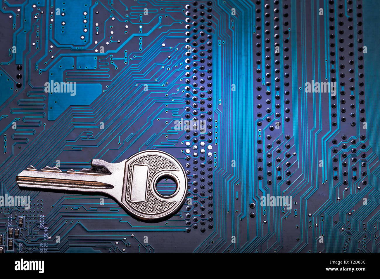 Background image of key on a microchip Stock Photo - Alamy