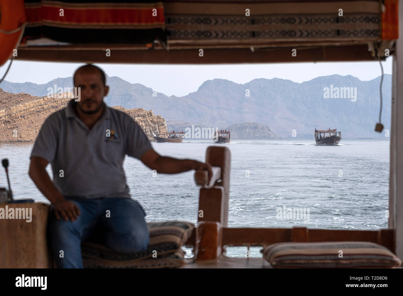 Cruise tour aboard a traditionally decorated arabian Dhow wooden boat ...