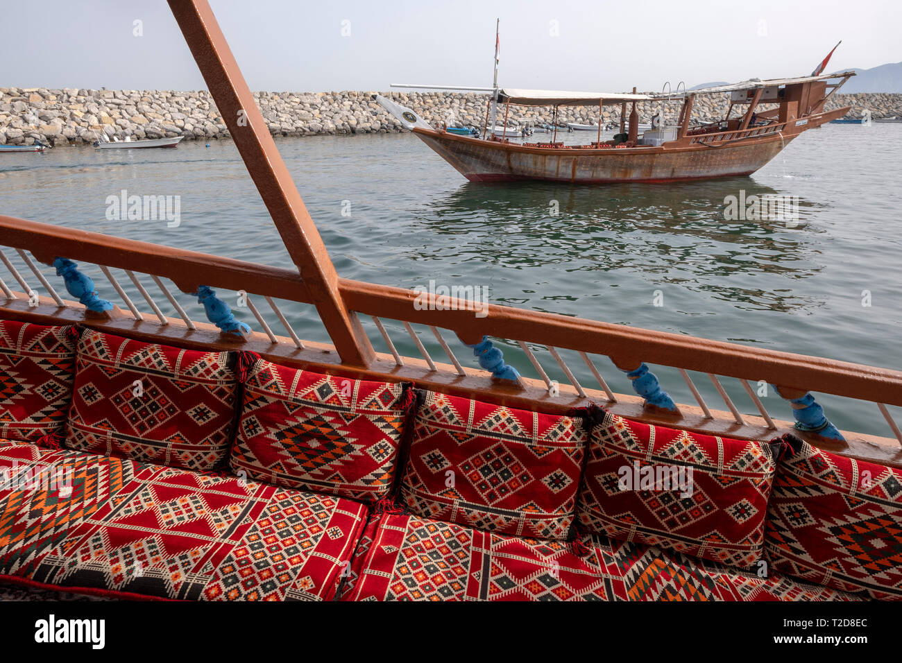 Cruise tour aboard a traditionally decorated arabian Dhow wooden boat ...