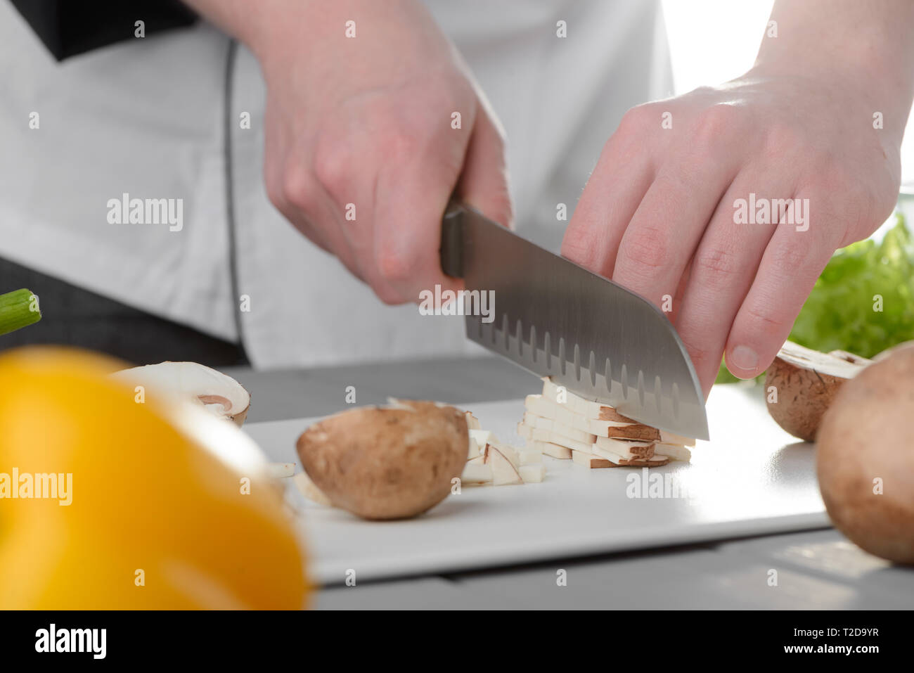 Cutting red tomato small pieces hi-res stock photography and images - Alamy