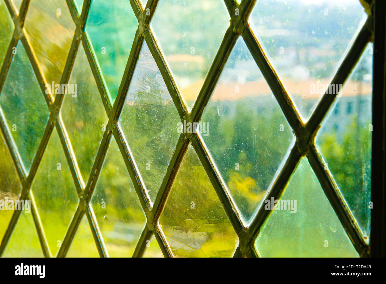 Detail of an old window with handmade leaded glass Stock Photo - Alamy