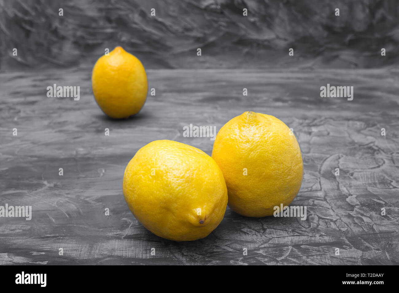 Fresh Lemon isolated on a dark background, citrus fruit Stock Photo - Alamy
