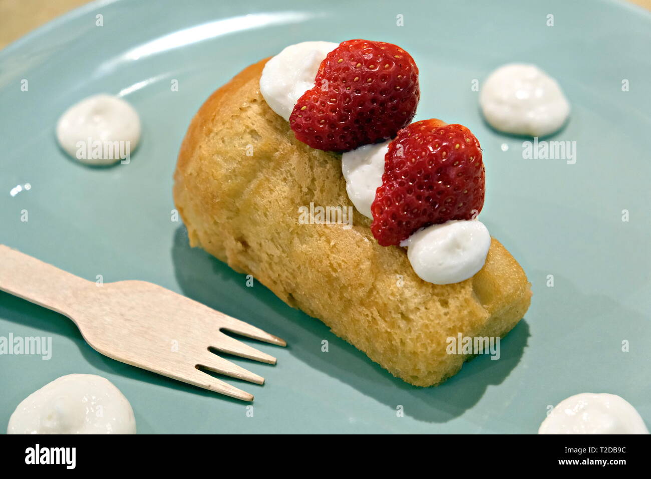 sicilian baba with cream and strawberries Stock Photo - Alamy