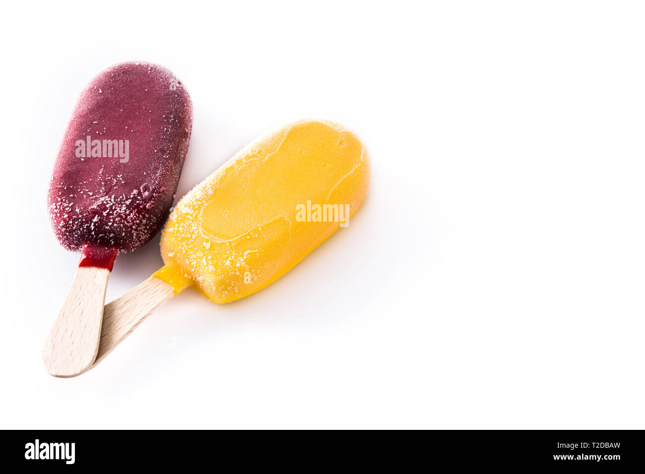 Yellow and red popsicles isolated on white background. Copyspace Stock ...
