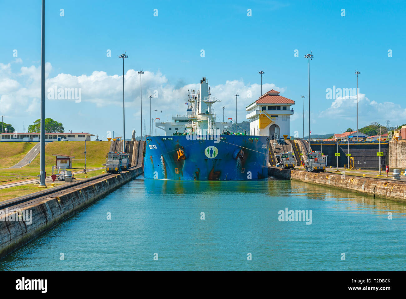 A crude oil tanker transport passing through the Panama Canal at the ...
