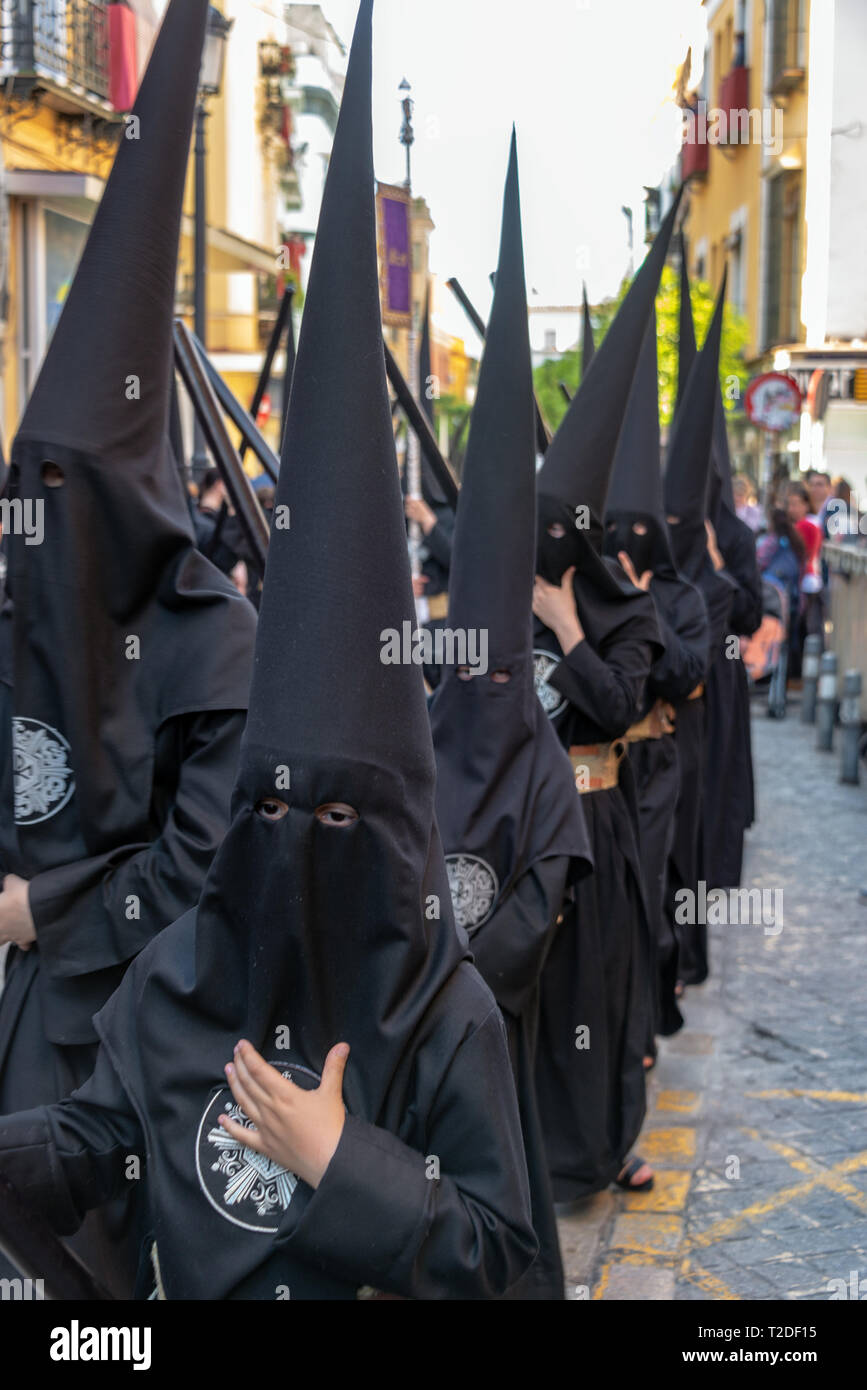 SEVILLE, SPAIN - MARCH 27: People dressed in all black for a Holy Week ...