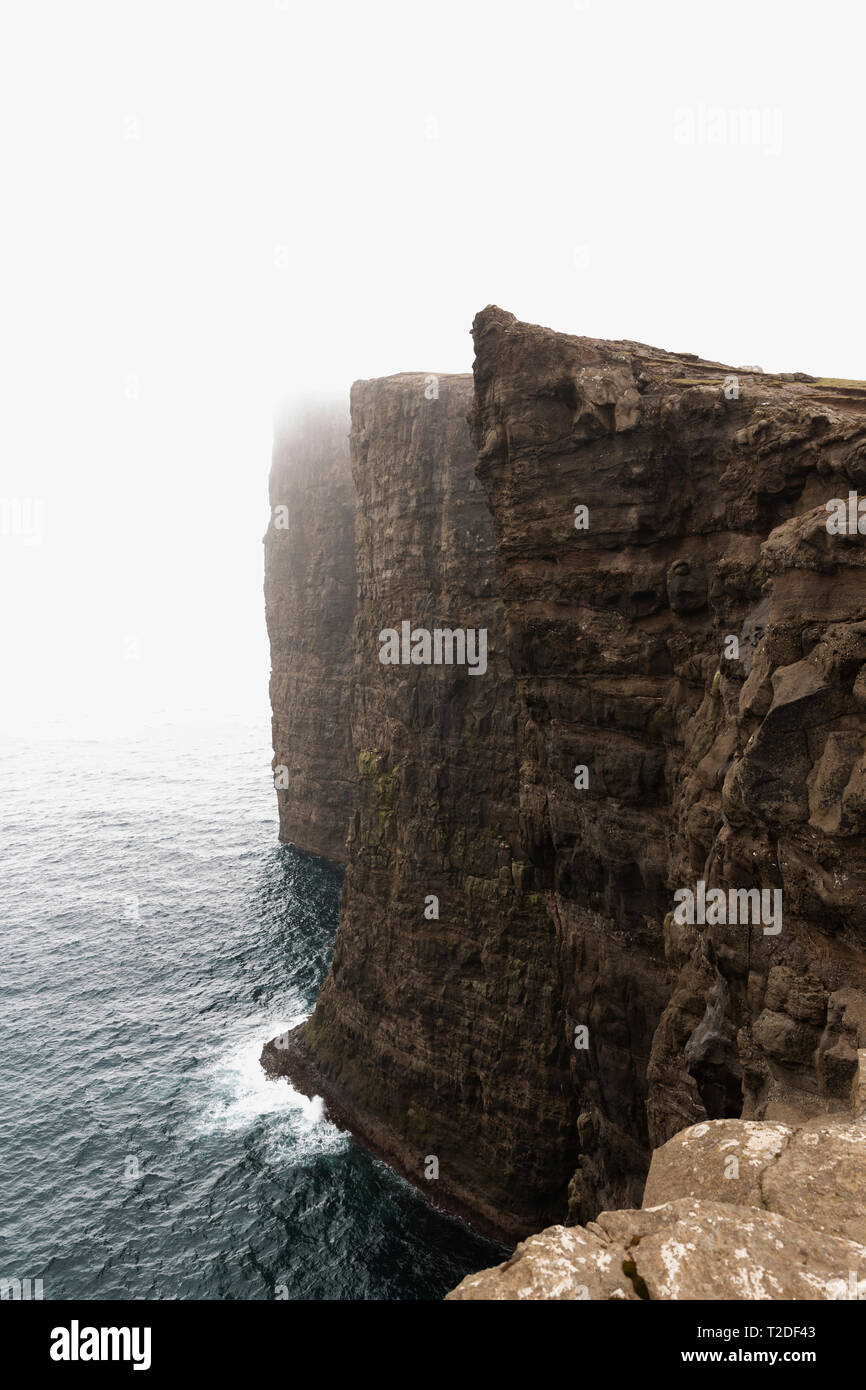 Giant Cliff to the Ocean Stock Photo - Alamy
