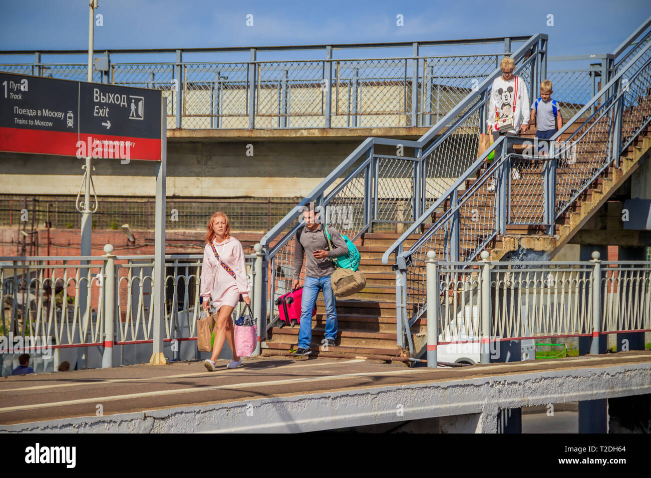 Crowd of people walking on busy station platform hi-res stock ...