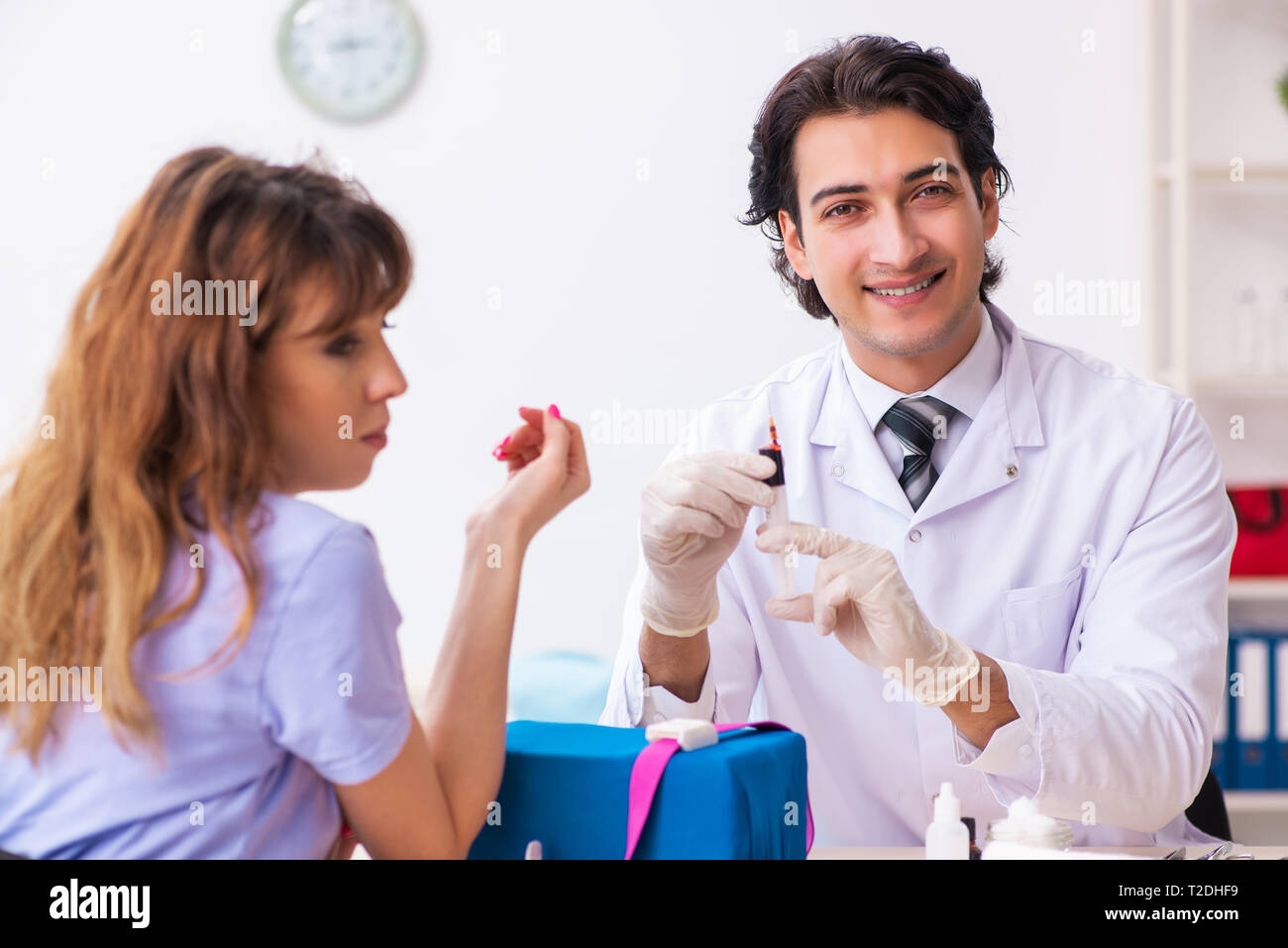 Female patient during blood test sampling procedure Stock Photo - Alamy
