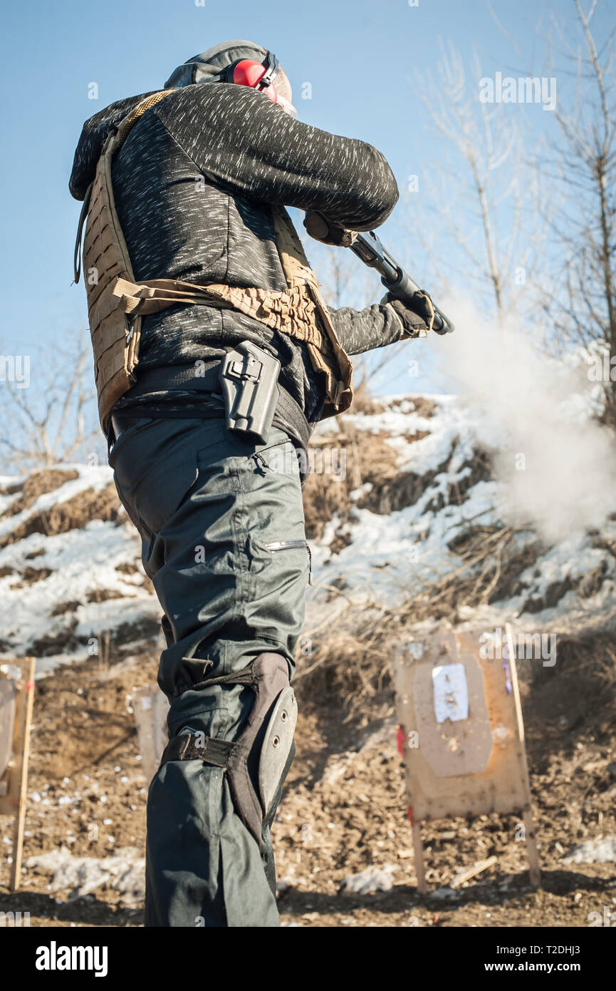 Combat shotgun shooting training. Long gun, pump gun and scattergun ...