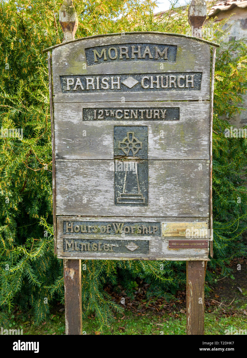 12th century Morham Parish Church faded wooden information board, East ...