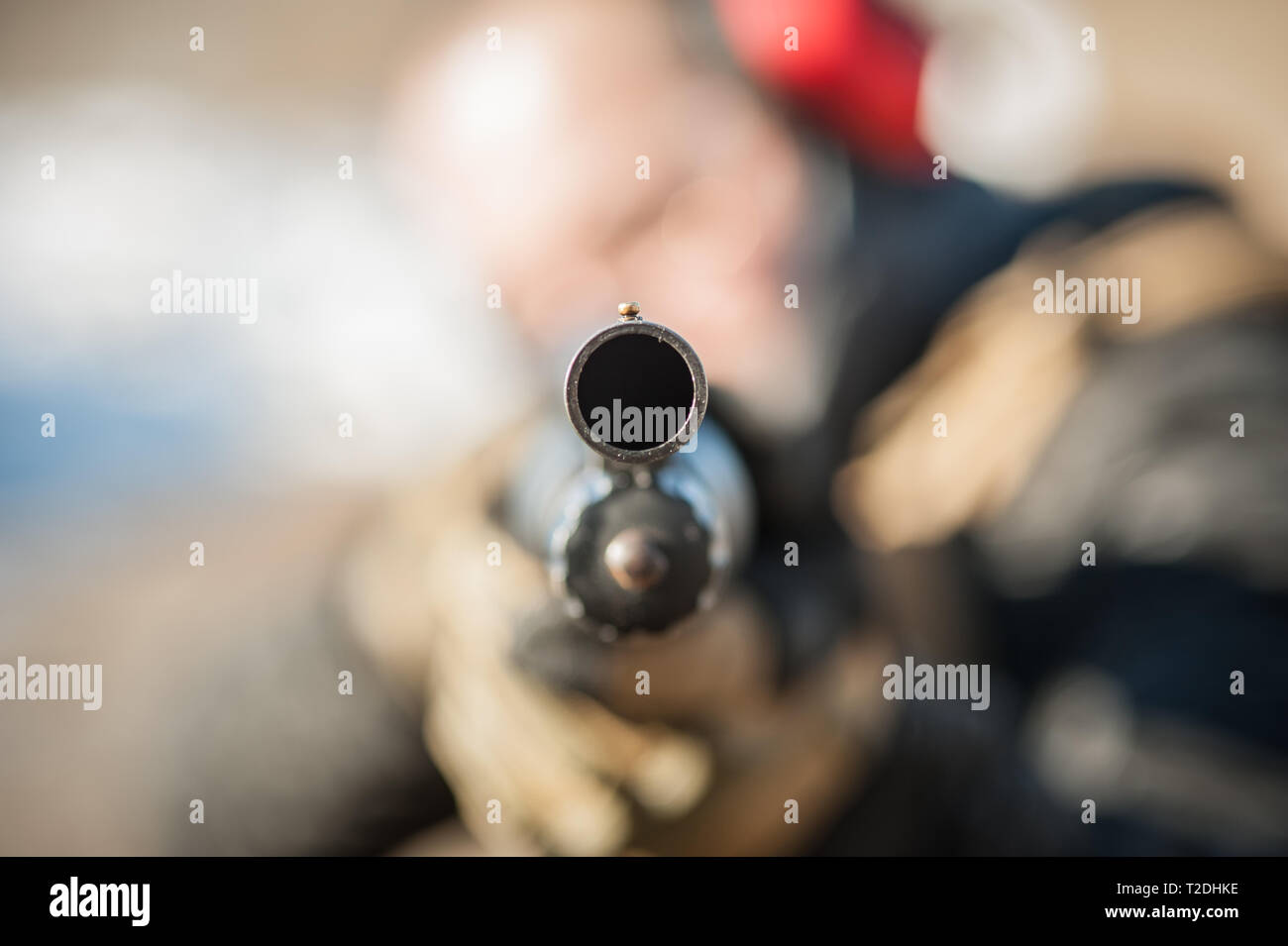 Direct macro detail close-up shotgun front view gun point. Firearm ...
