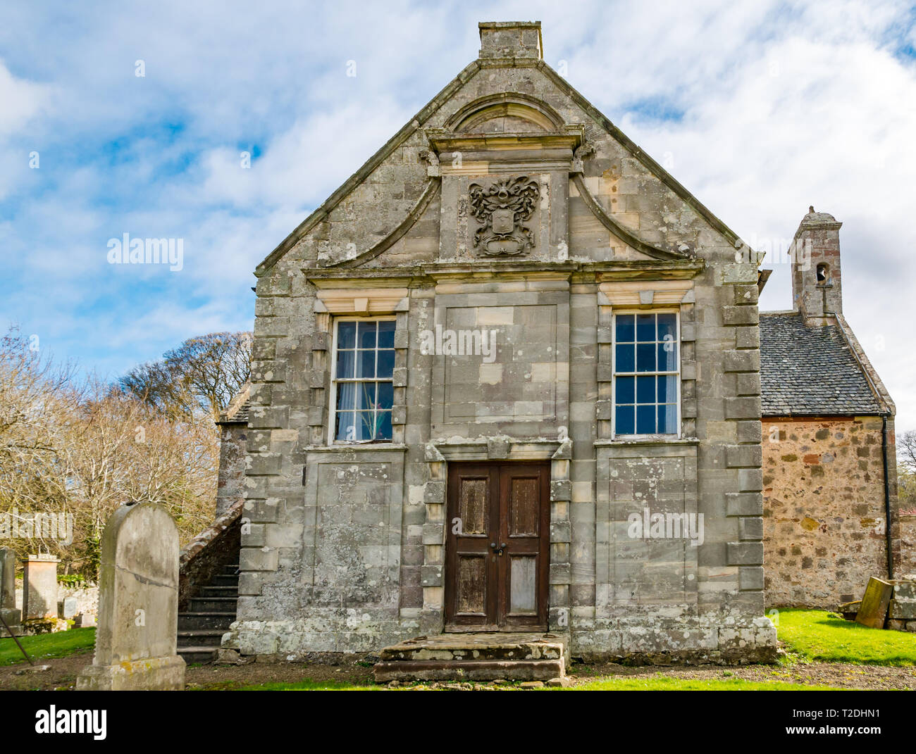 12th century Morham Parish Church and old graveyard with worn ...
