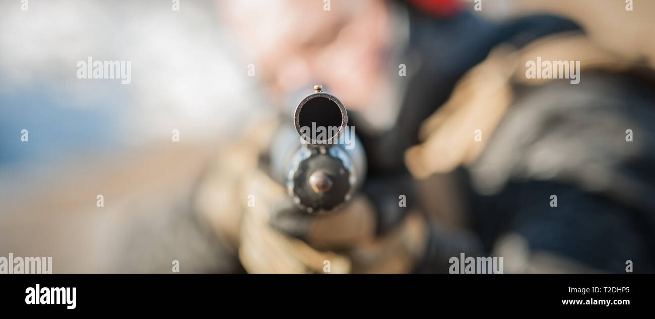 Direct macro detail close-up shotgun front view gun point. Firearm ...