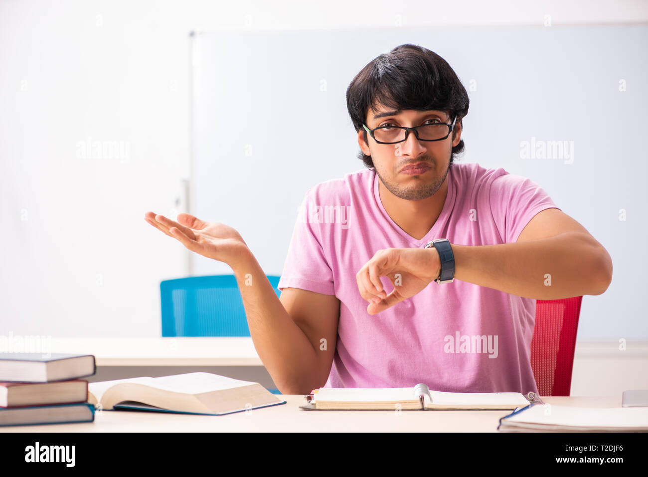Male student late in class hi-res stock photography and images - Alamy