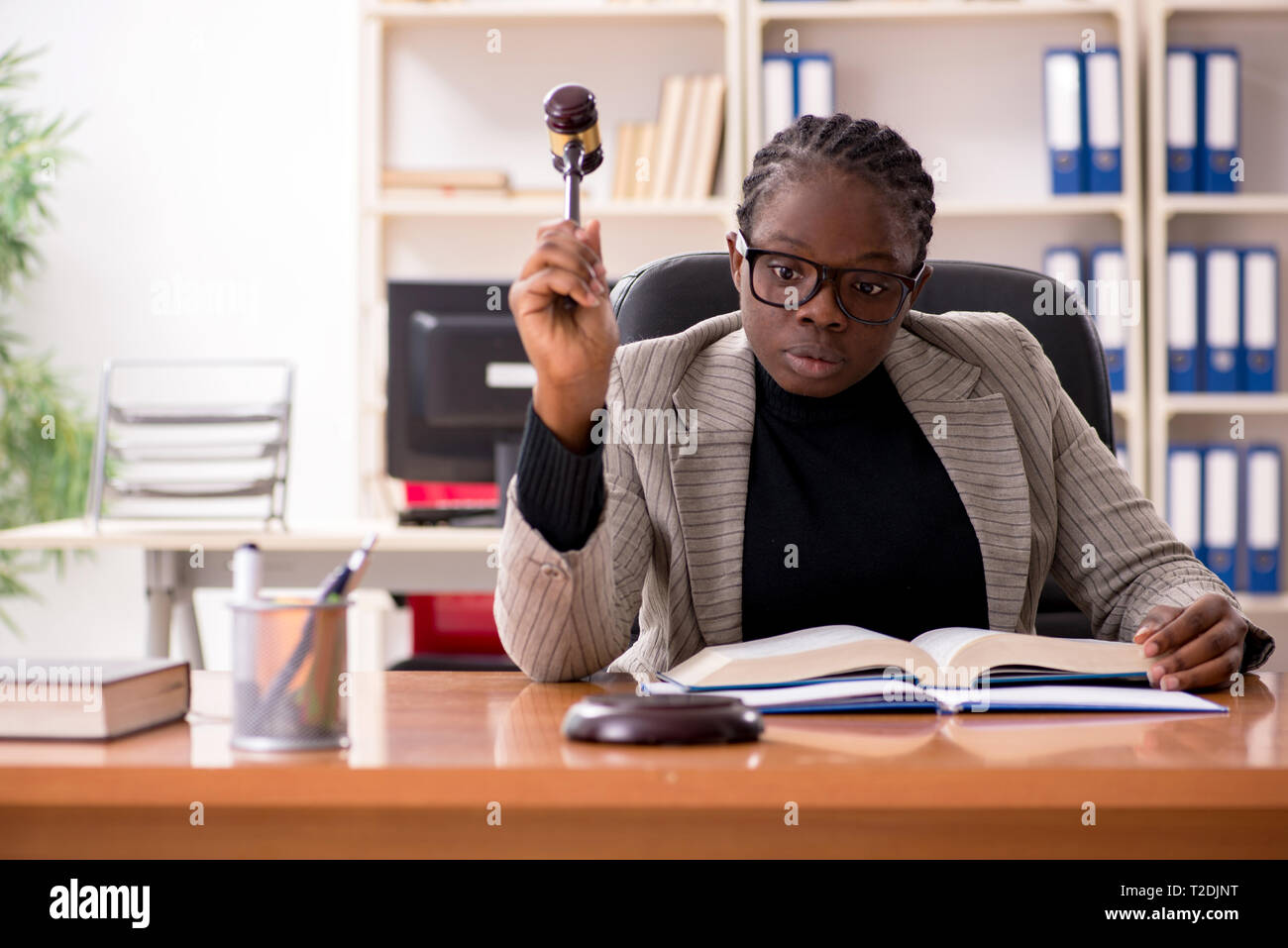 Black female lawyer in courthouse Stock Photo - Alamy