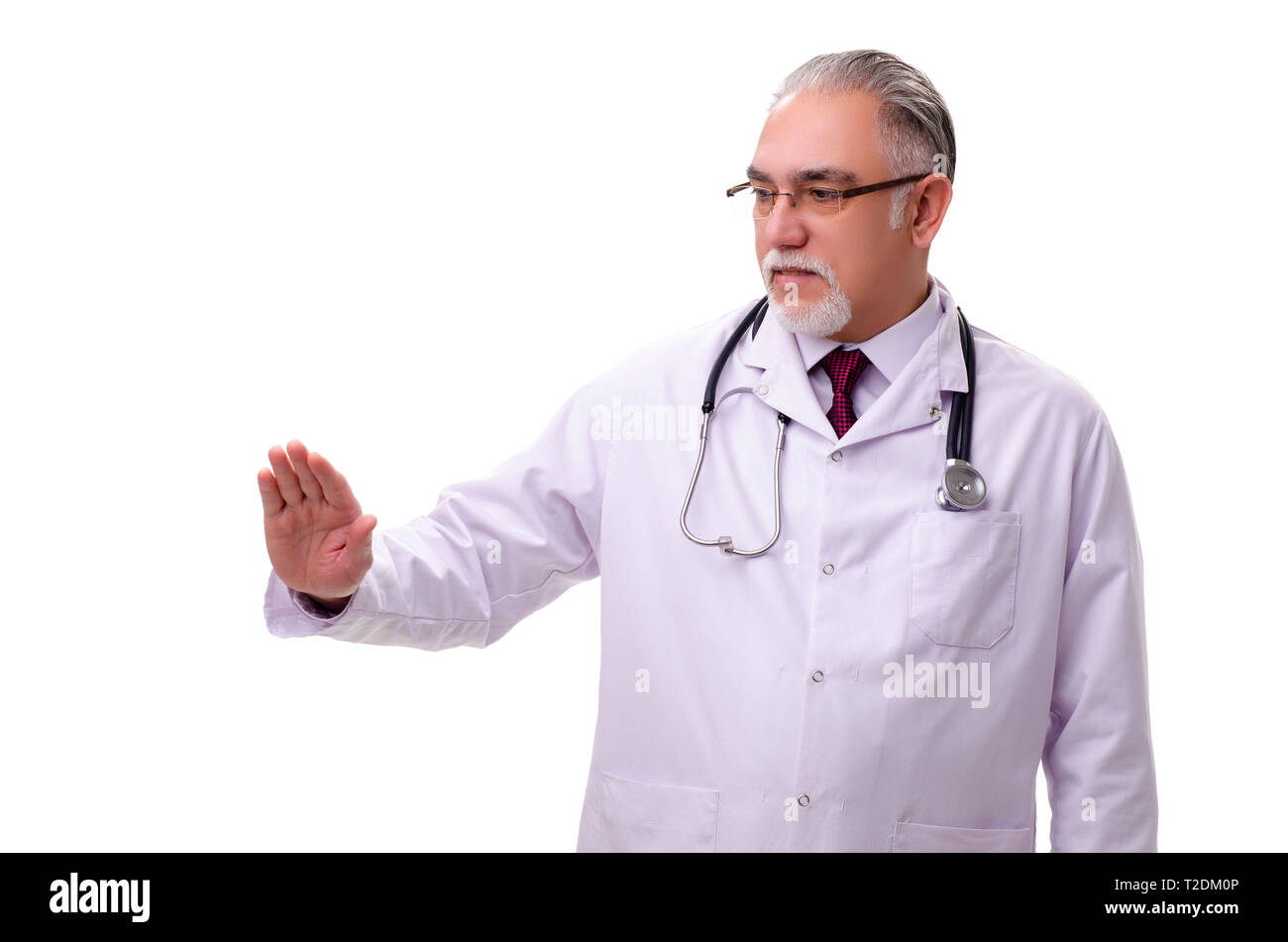 Old male doctor isolated on white Stock Photo - Alamy