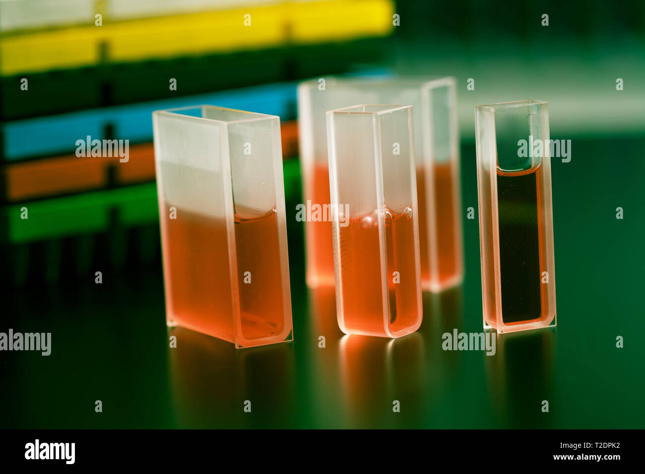 Quartz cuvette with the sample liquid for measurement Stock Photo - Alamy