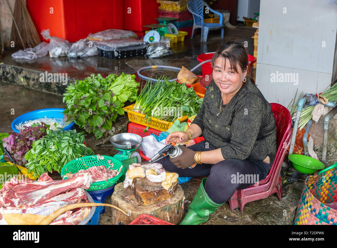Butcher's stall with fresh meat and butchered animals, street market ...