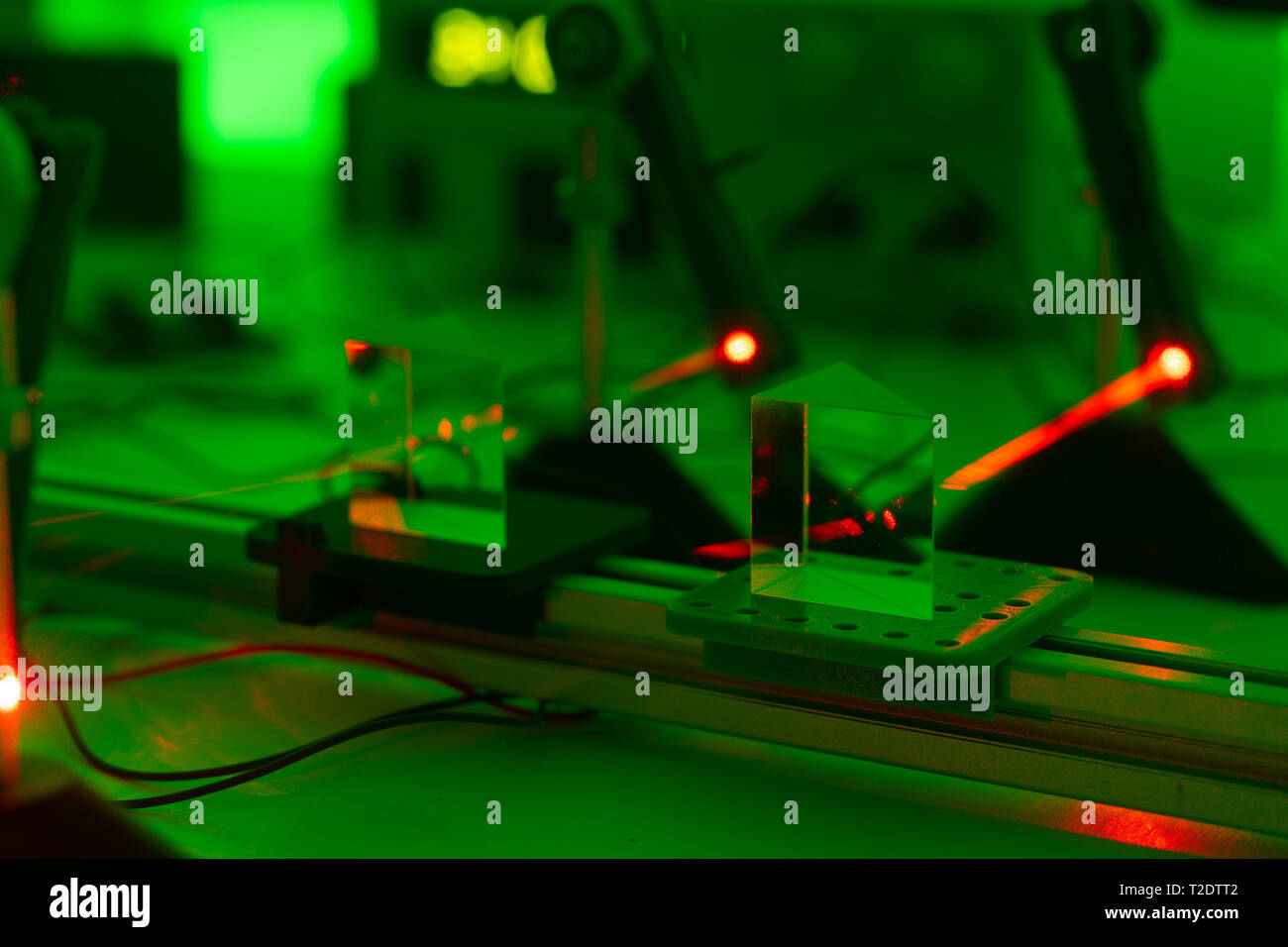Experiment with a red laser in a physics lab Stock Photo - Alamy