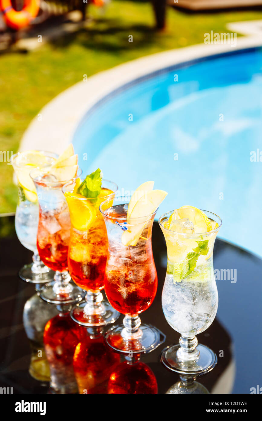 Craft cocktails near the pool. Vacation, summer, holiday, luxury resort ...