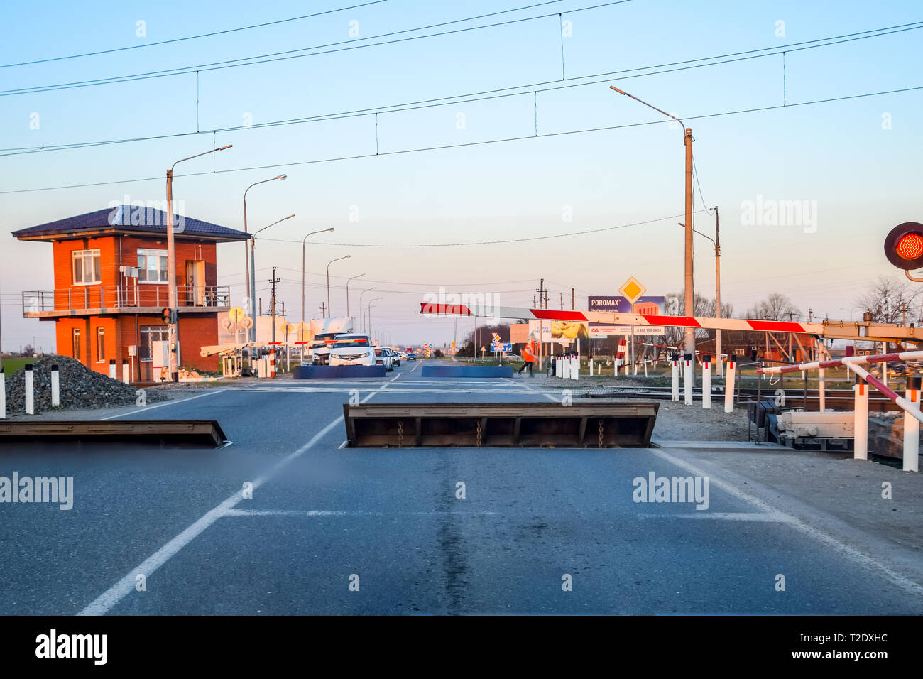 Krasnodar, Russia - March 31, 2018: Railroad crossing with a barrier ...