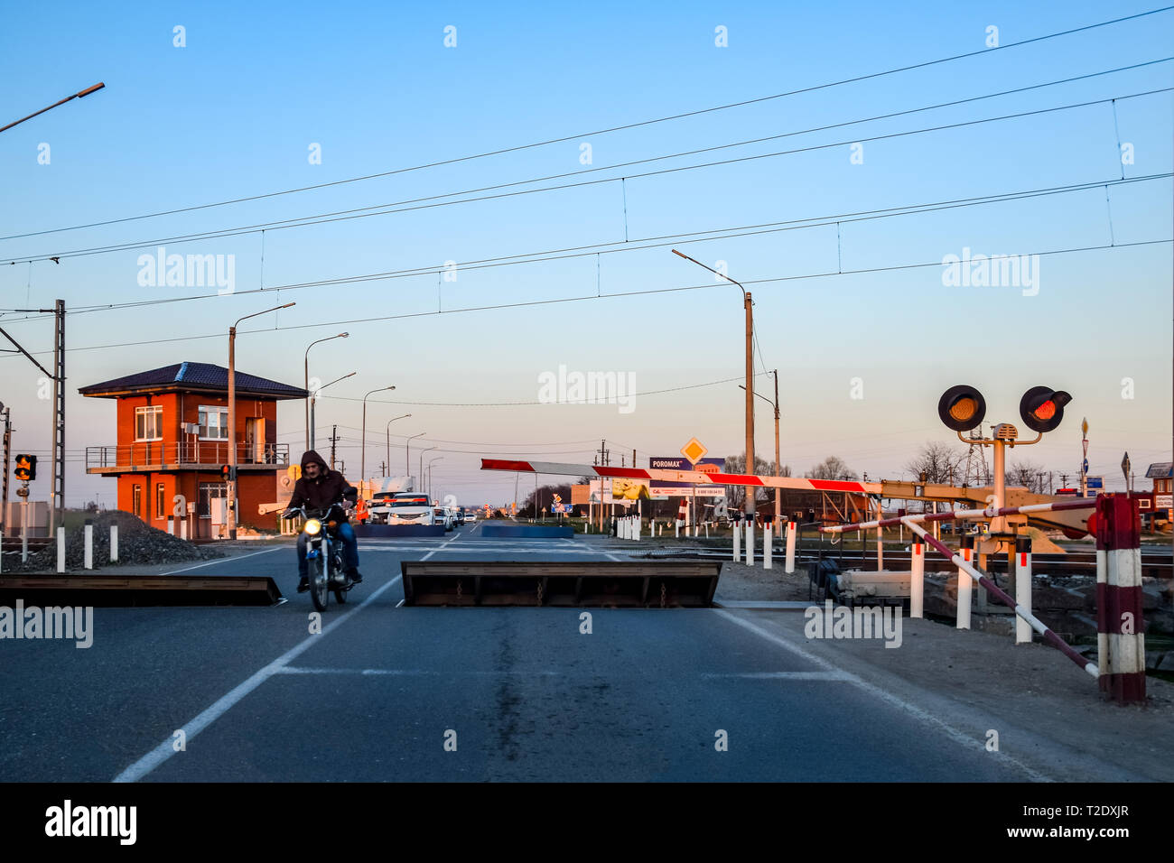 Krasnodar, Russia - March 31, 2018: Railroad crossing with a barrier ...