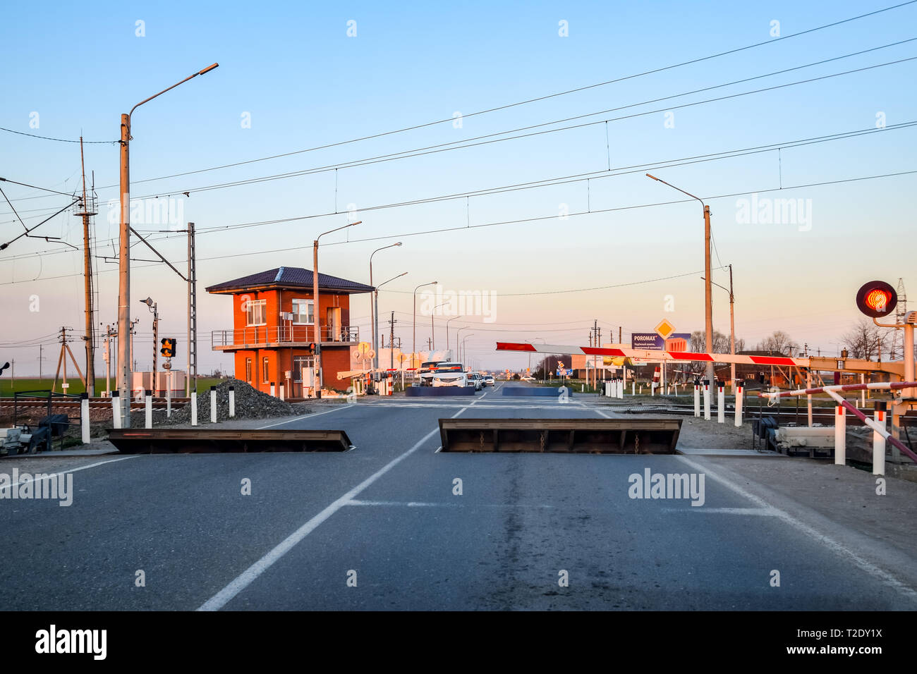 Krasnodar, Russia - March 31, 2018: Railroad crossing with a barrier ...