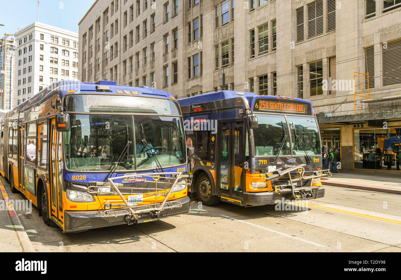SEATTLE, WASHINGTON STATE, USA - JUNE 2018: Two public service buses ...