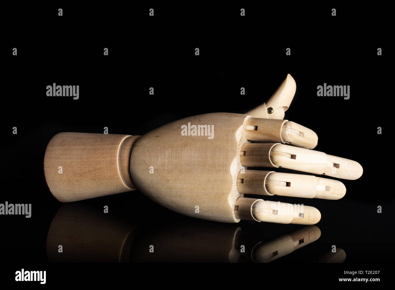 One finger is clenched. deaf sign language isolated on black glass ...