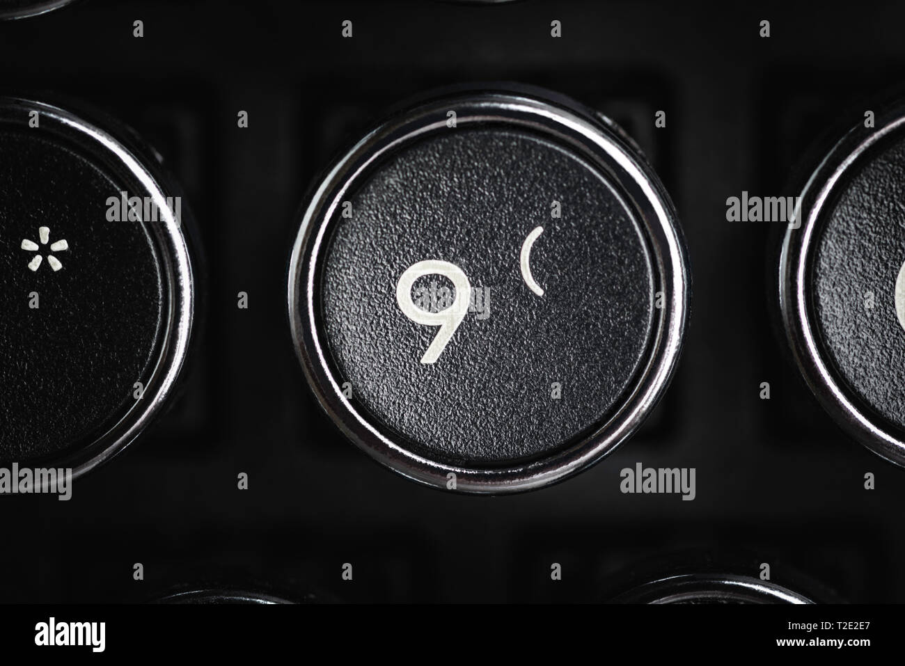 A macro or close-up shot of a retro style typewriter key cap keyboard ...