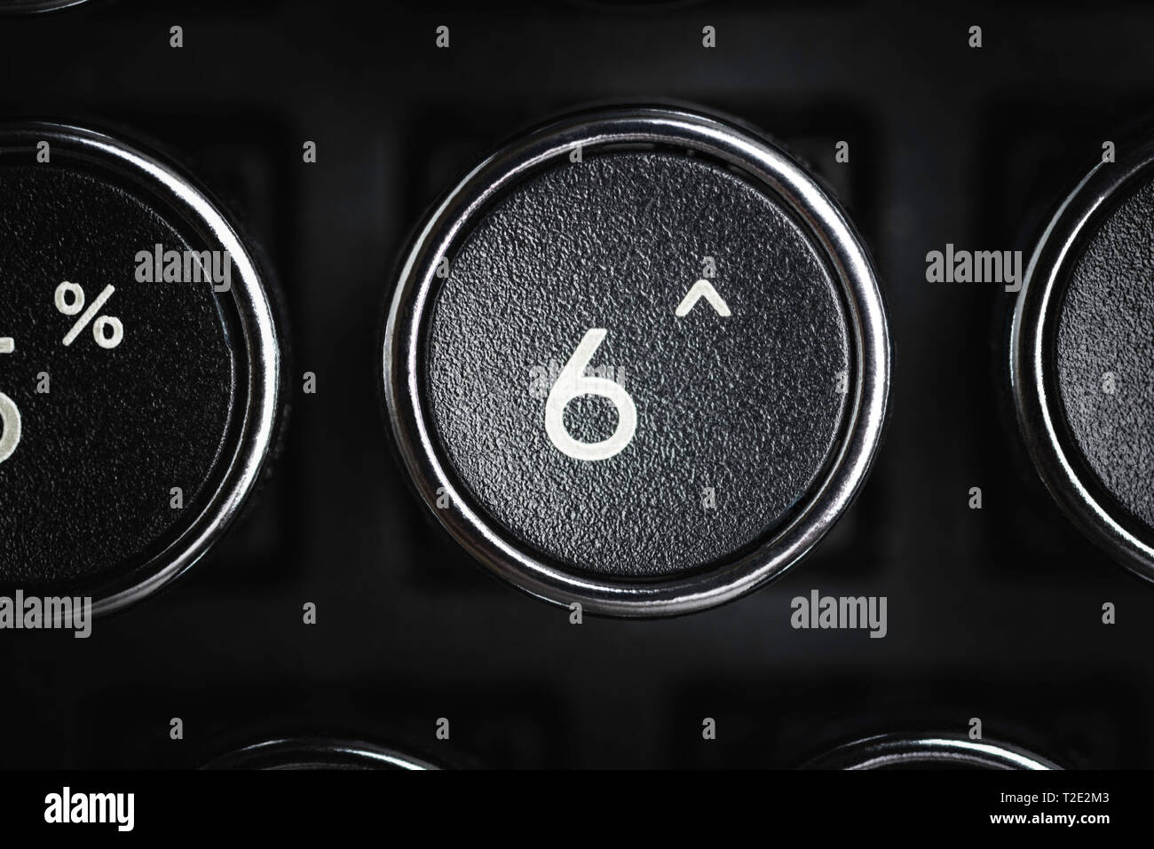A macro or close-up shot of a retro style typewriter key cap keyboard ...