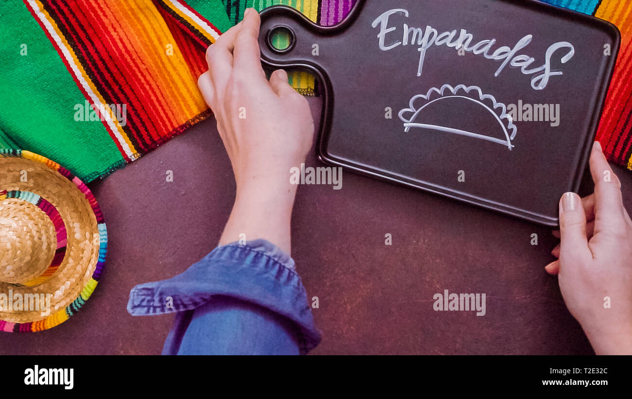 Flat lay. Writing Emapandas sign on black chalk board Stock Photo - Alamy