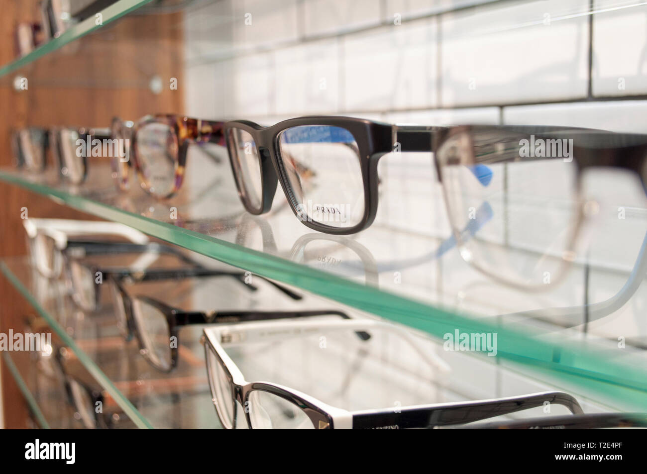 Eye glasses sitting in a display Stock Photo - Alamy
