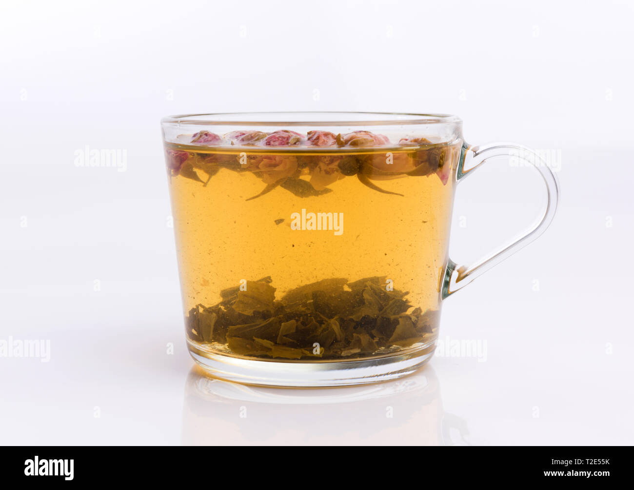 Glass cup of green tea with roses. Isolated on white background Stock ...