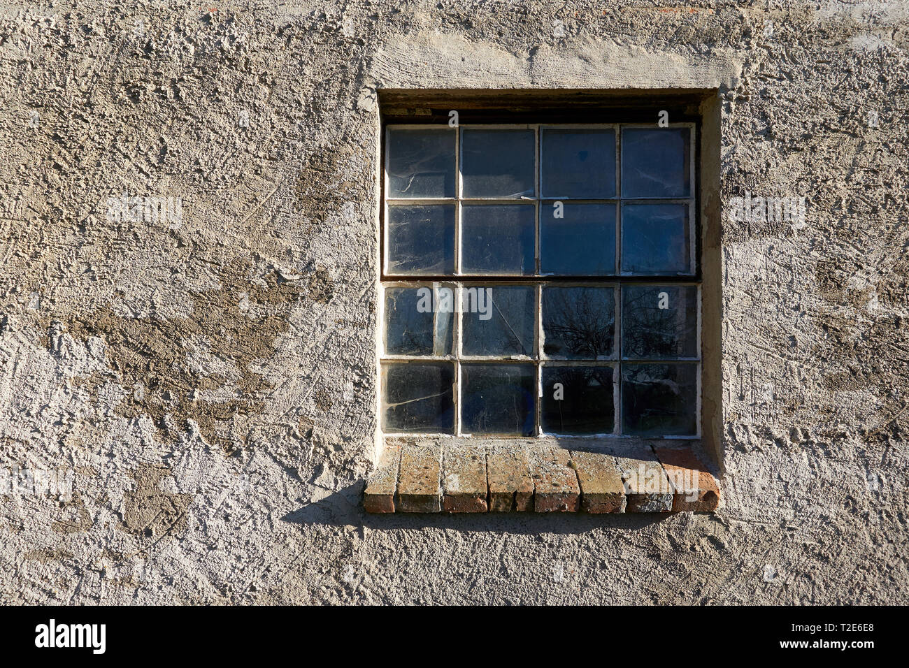 cracked color on a wall outside Stock Photo - Alamy