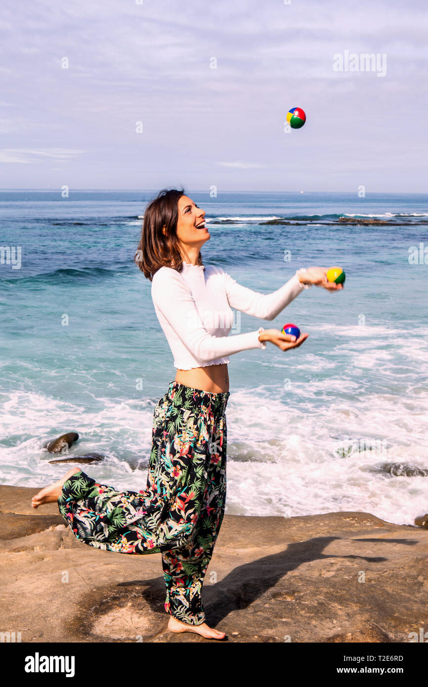 Woman juggling balls hi-res stock photography and images - Alamy