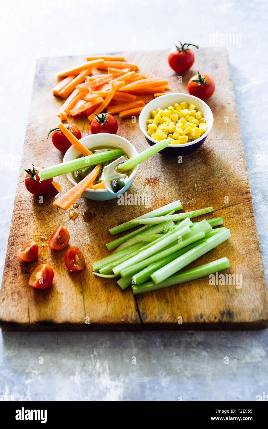 Typical italian "pinzimonio", vegetables carrots celery dipped in olive ...